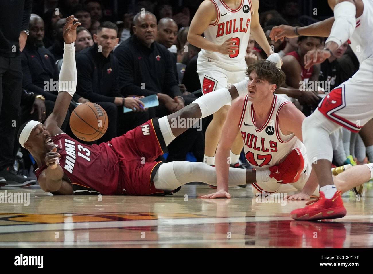 Miami Heat center Bam Adebayo (13) goes for a loose ball against ...