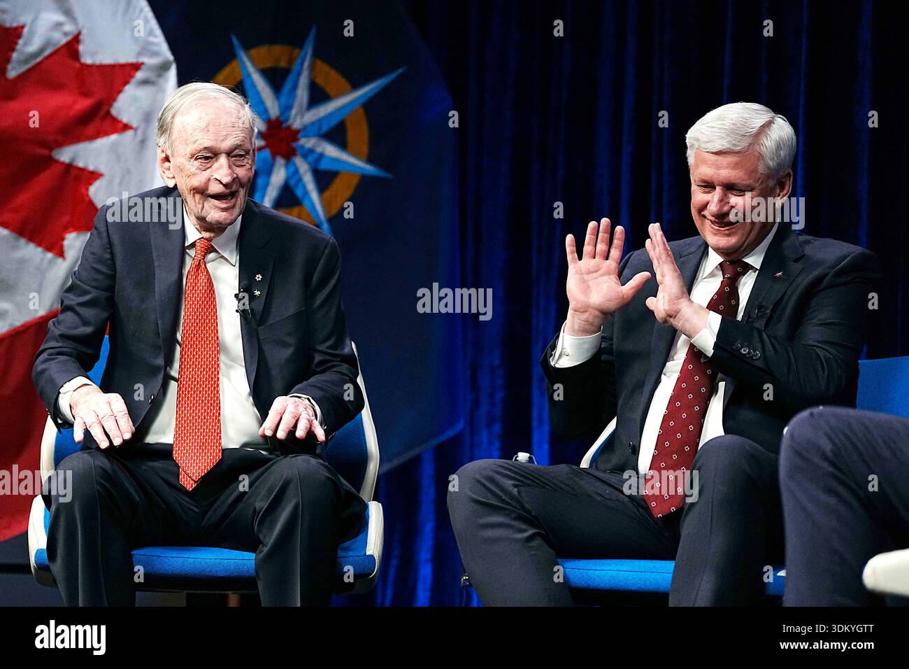 Former prime minister Stephen Harper, right, reacts after former prime ...
