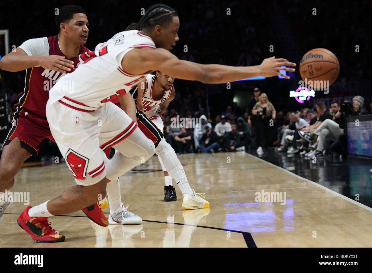 Chicago Bulls forward Isaac Okoro (35) reaches for a loose ball during ...