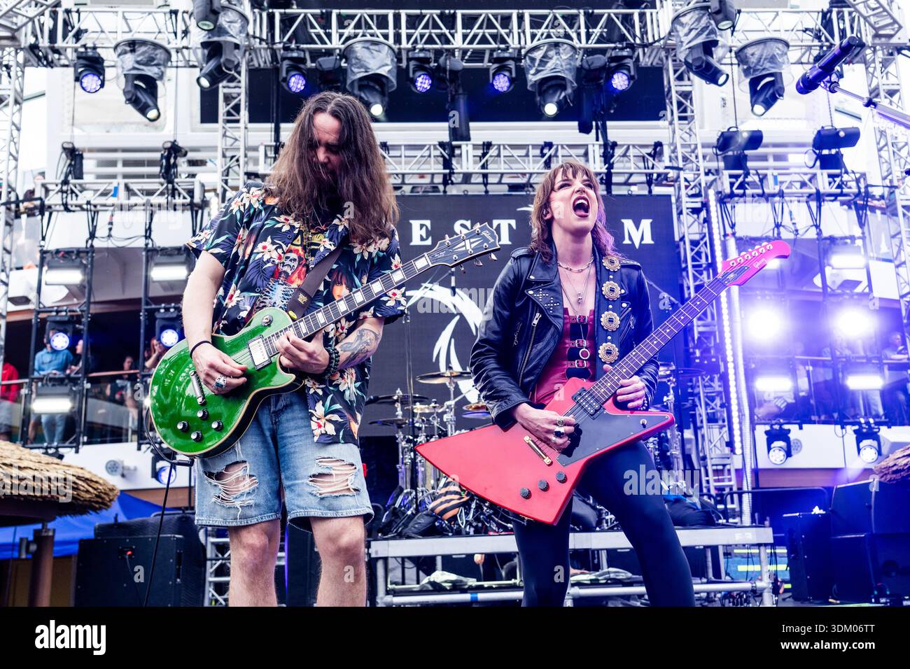 Joe Hottinger, left, and Lzzy Hale of Halestorm perform during the ...