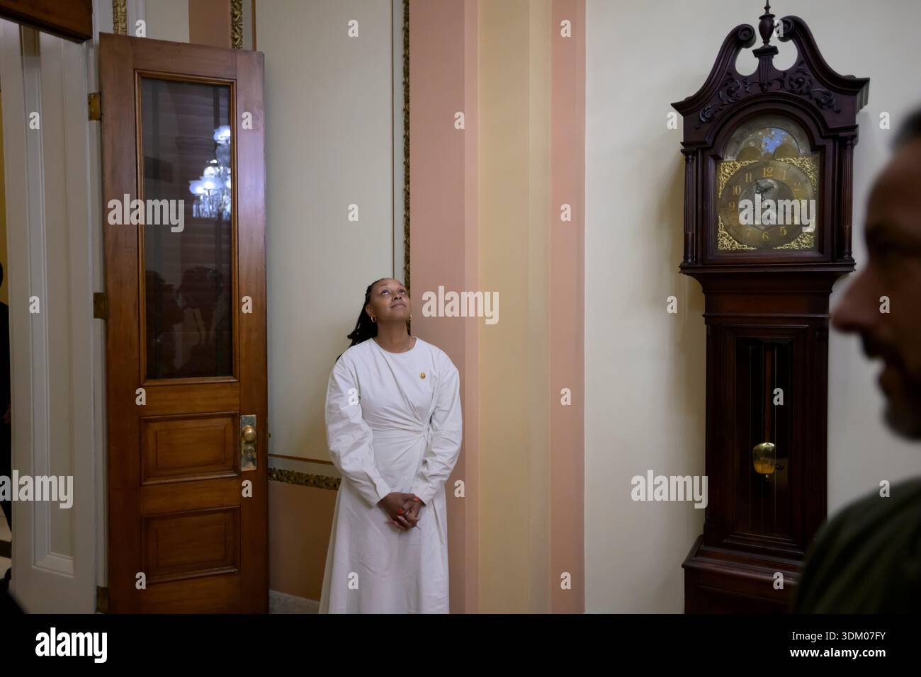 Kaitlyn Menefee waits for the arrival of her husband, Rep. Christian ...