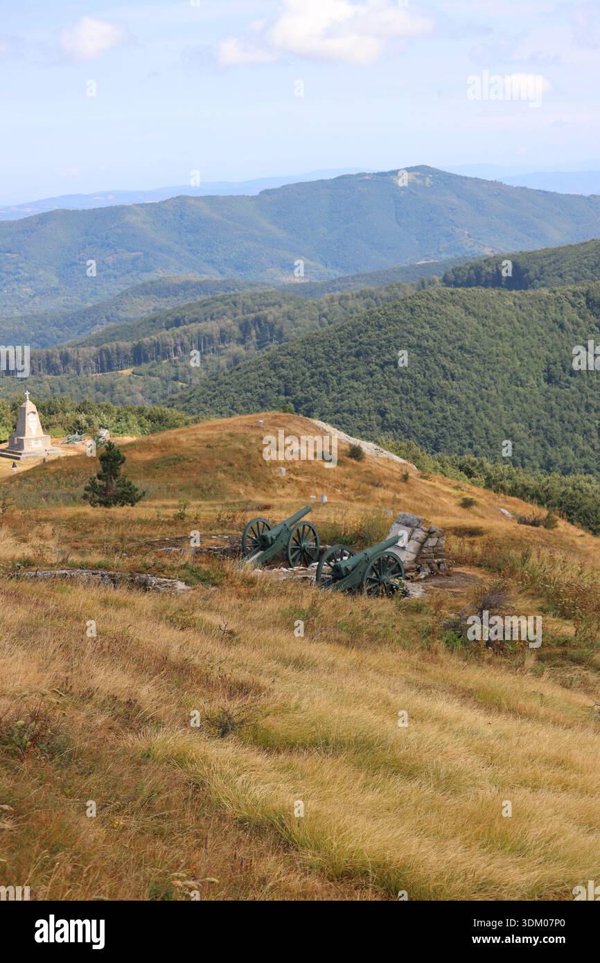 Historic military battlefield with antique cannons on forested mountain ...