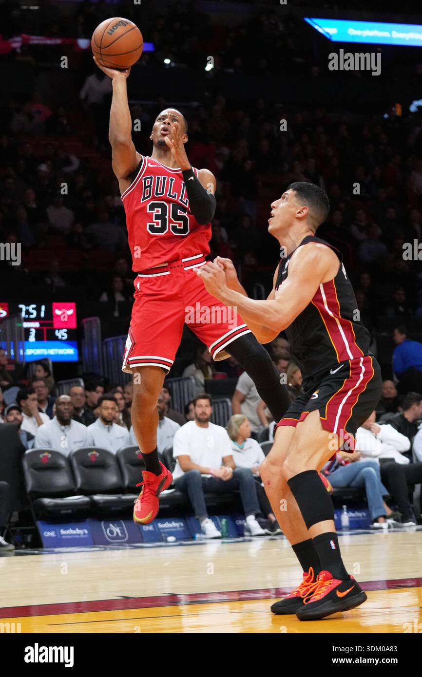 Chicago Bulls forward Isaac Okoro (35) shoots over Miami Heat forward ...