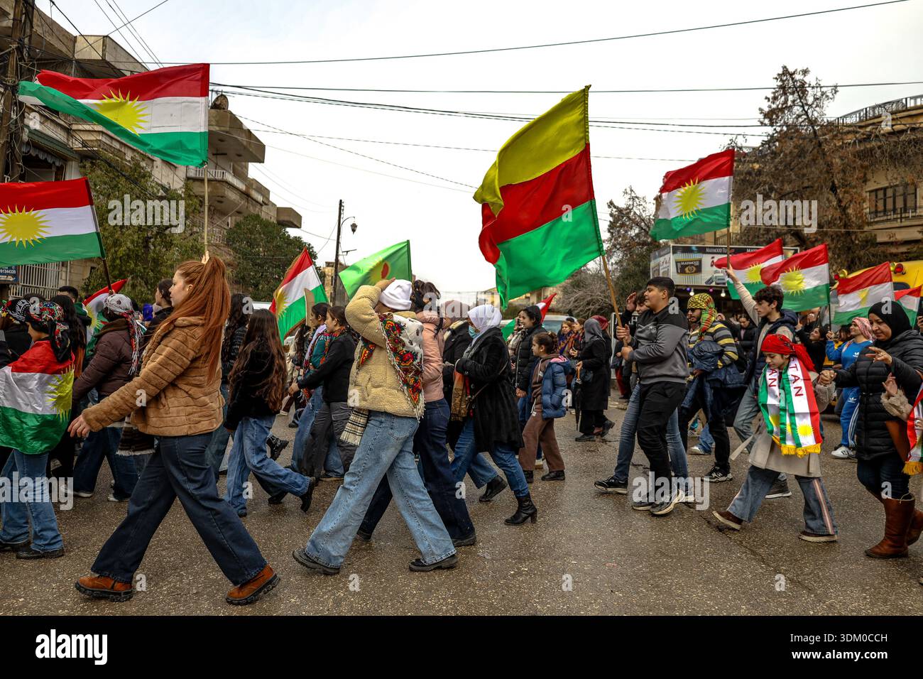 Kurdish demonstraters wave Kurdistan flags during a demonstration in ...