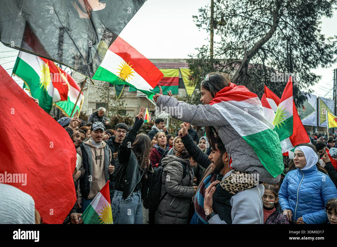 Kurdish demonstraters gather and wave Kurdistan flags during a ...