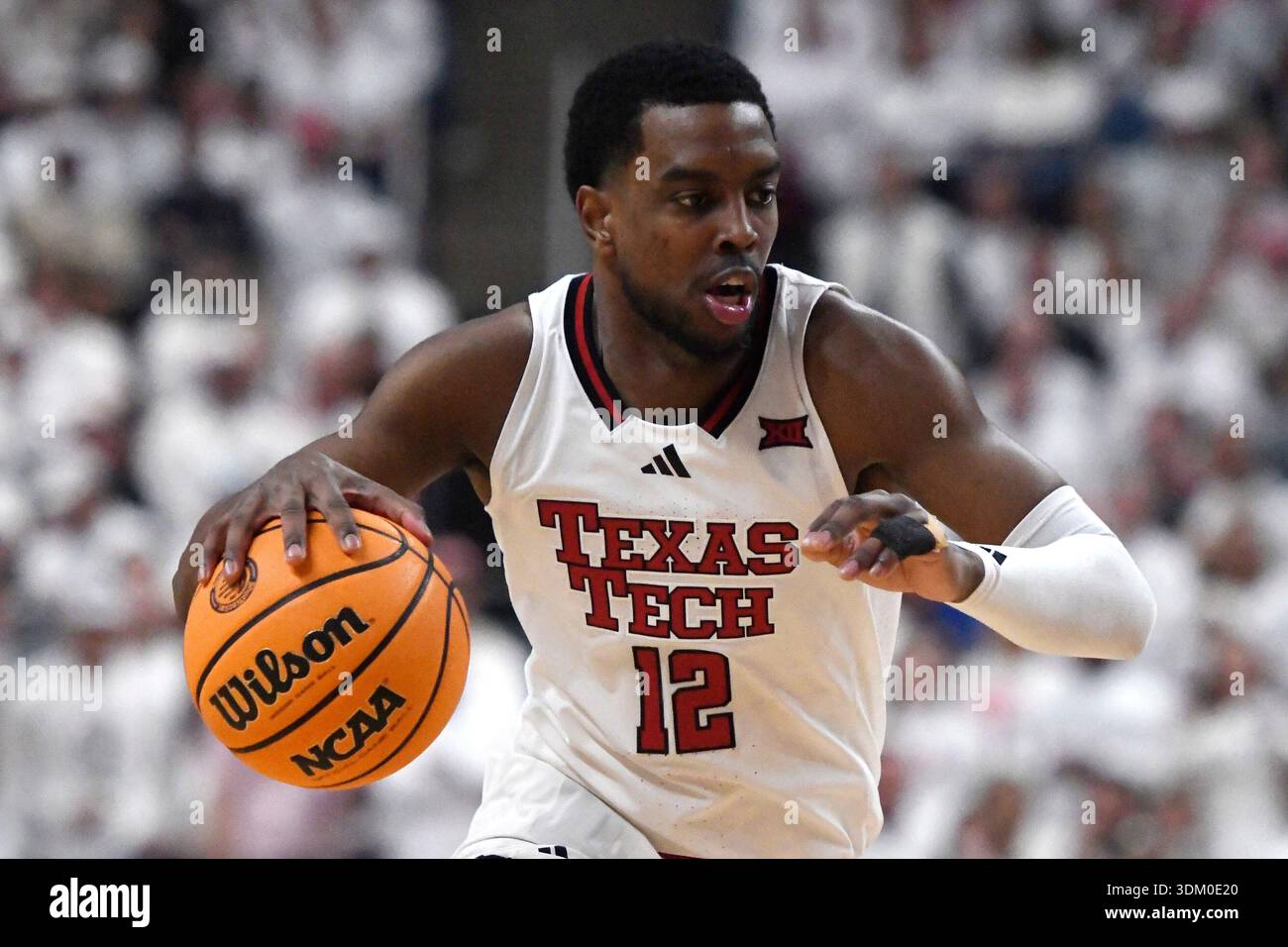 Texas Tech forward Donovan Atwell dribbles during the first half in an ...