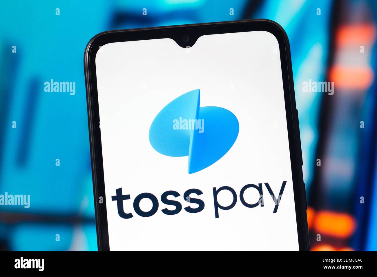 In this photo illustration, the Toss Pay logo is seen displayed on a ...