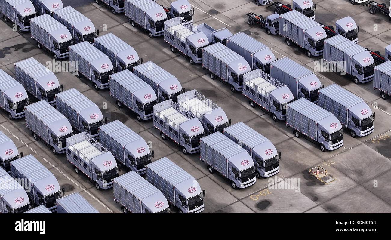 Aerial photo shows BYD new energy commercial vehicles at BYD's factory ...