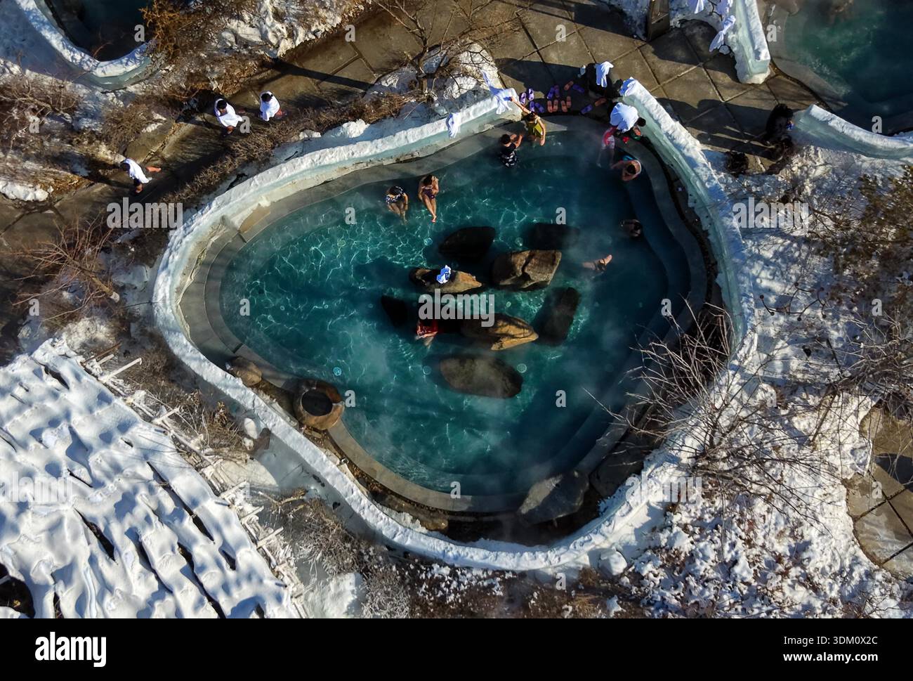 Aerial photo shows tourists soaking in outdoor hot springs in Shenyang ...