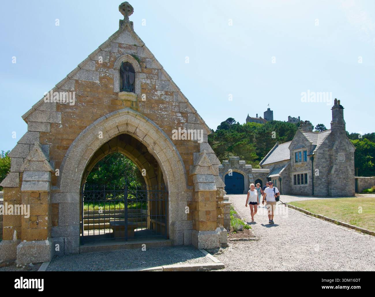 Coffin stone or coffin rest under the lychgate arch at the gated ...