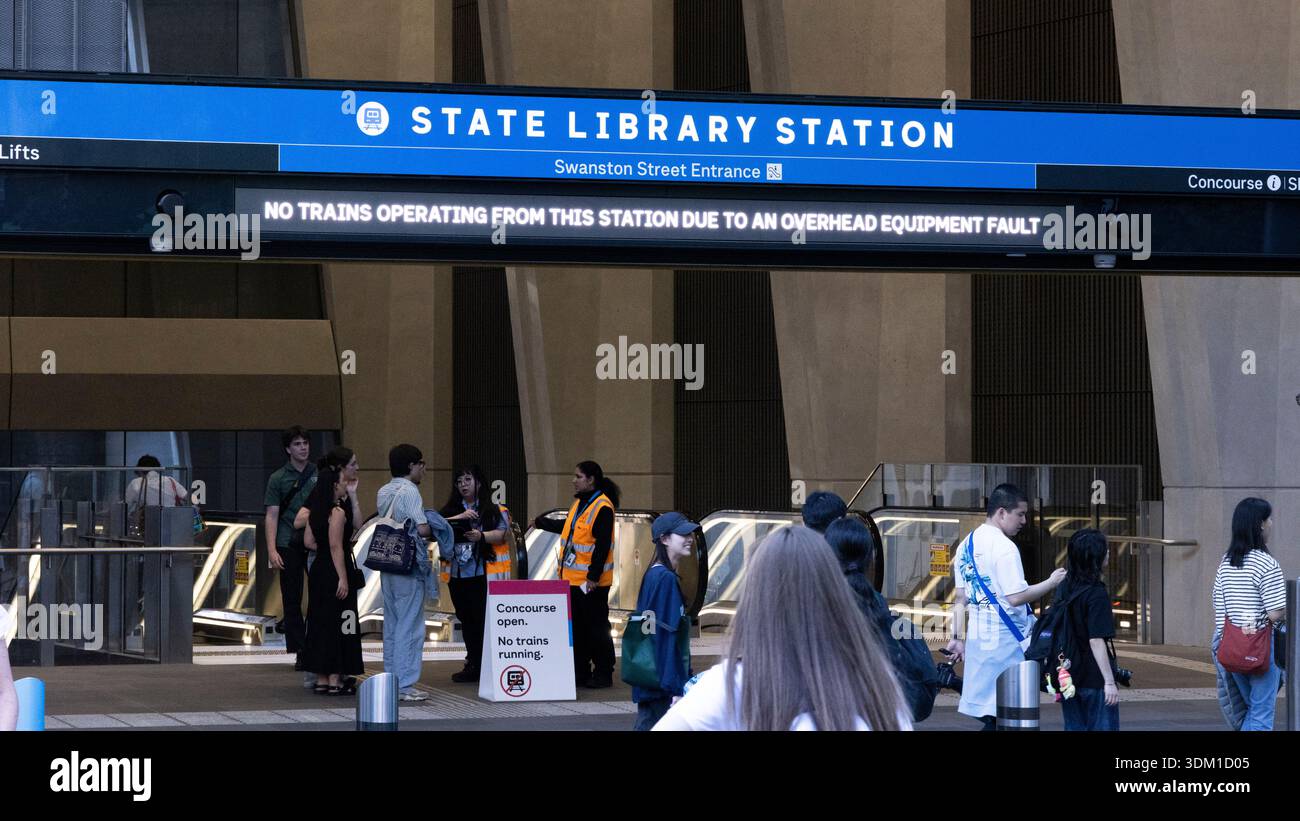 The State Library Station sign seen displaying a message stating "No ...