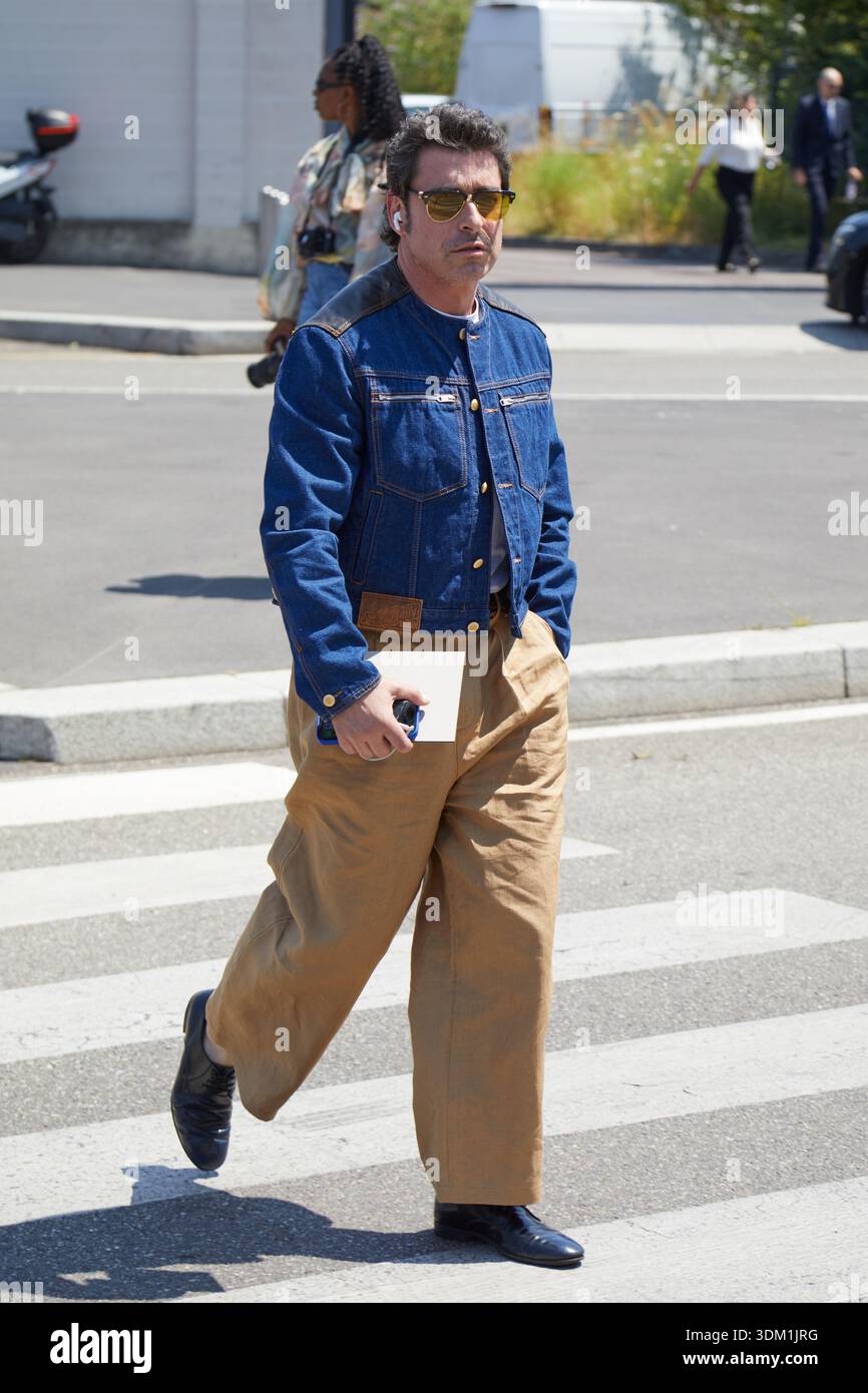 MILAN, ITALY - JUNE 22, 2025: Alex Badia with blue denim jacket and ...