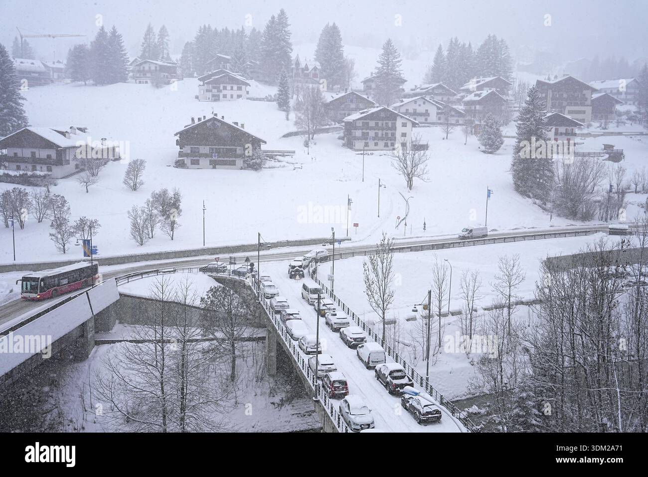 A view shows houses and cars covered in snow ahead of the Olympic ...