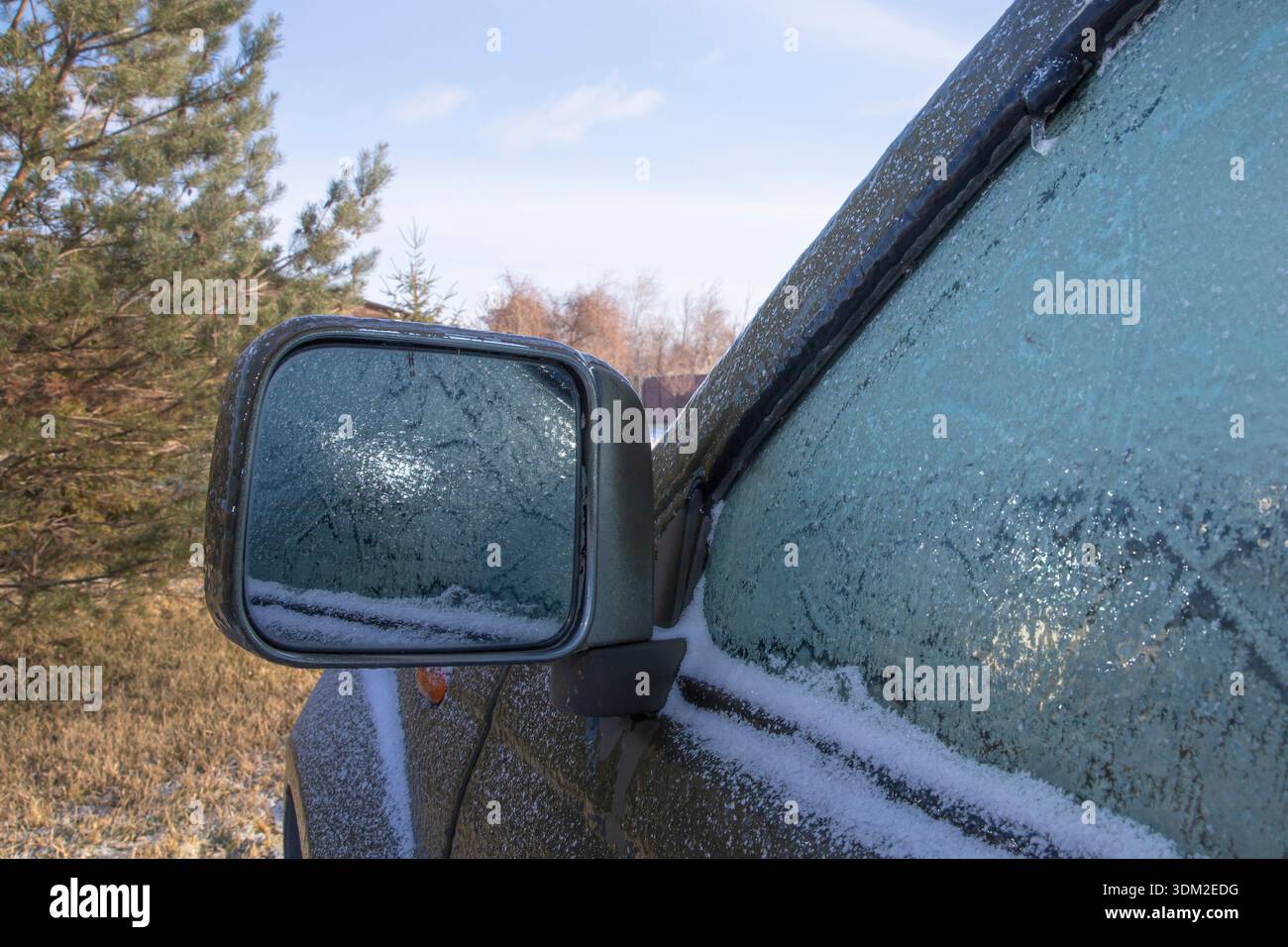 Frozen car side window covered with frost on cold winter morning Stock ...