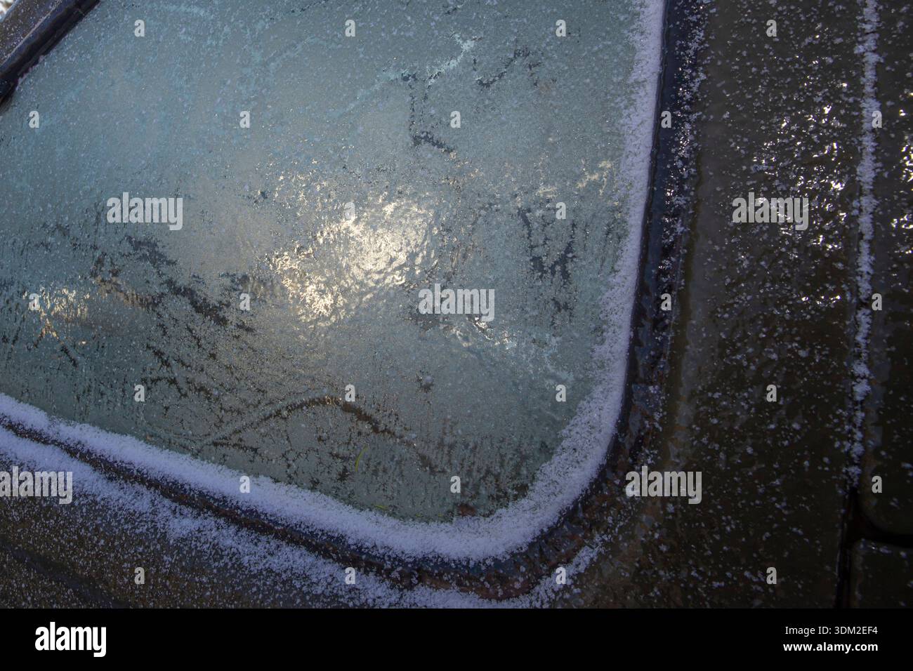 Frozen car side window covered with frost on cold winter morning Stock ...
