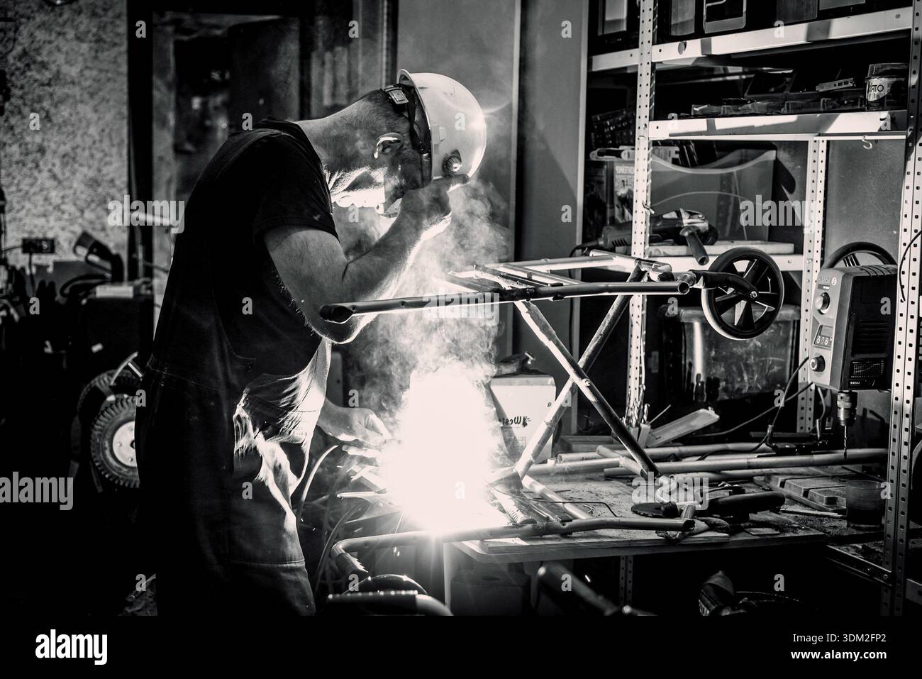 Saint Petersburg, Russia, 7 May 2019, Man repairing broken wheelchair ...