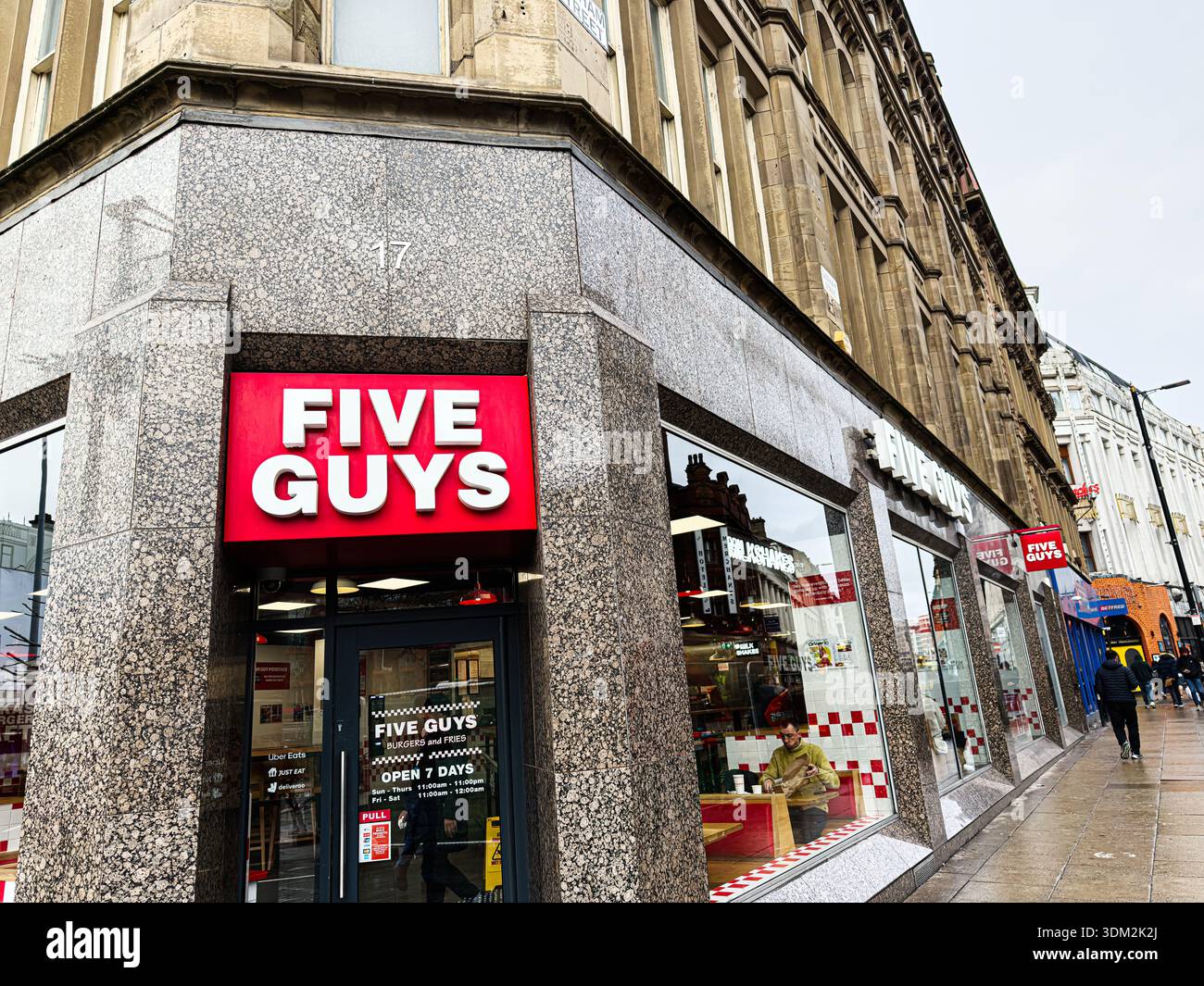 Manchester, UK - January 21, 2026: Casual urban dining scene in ...