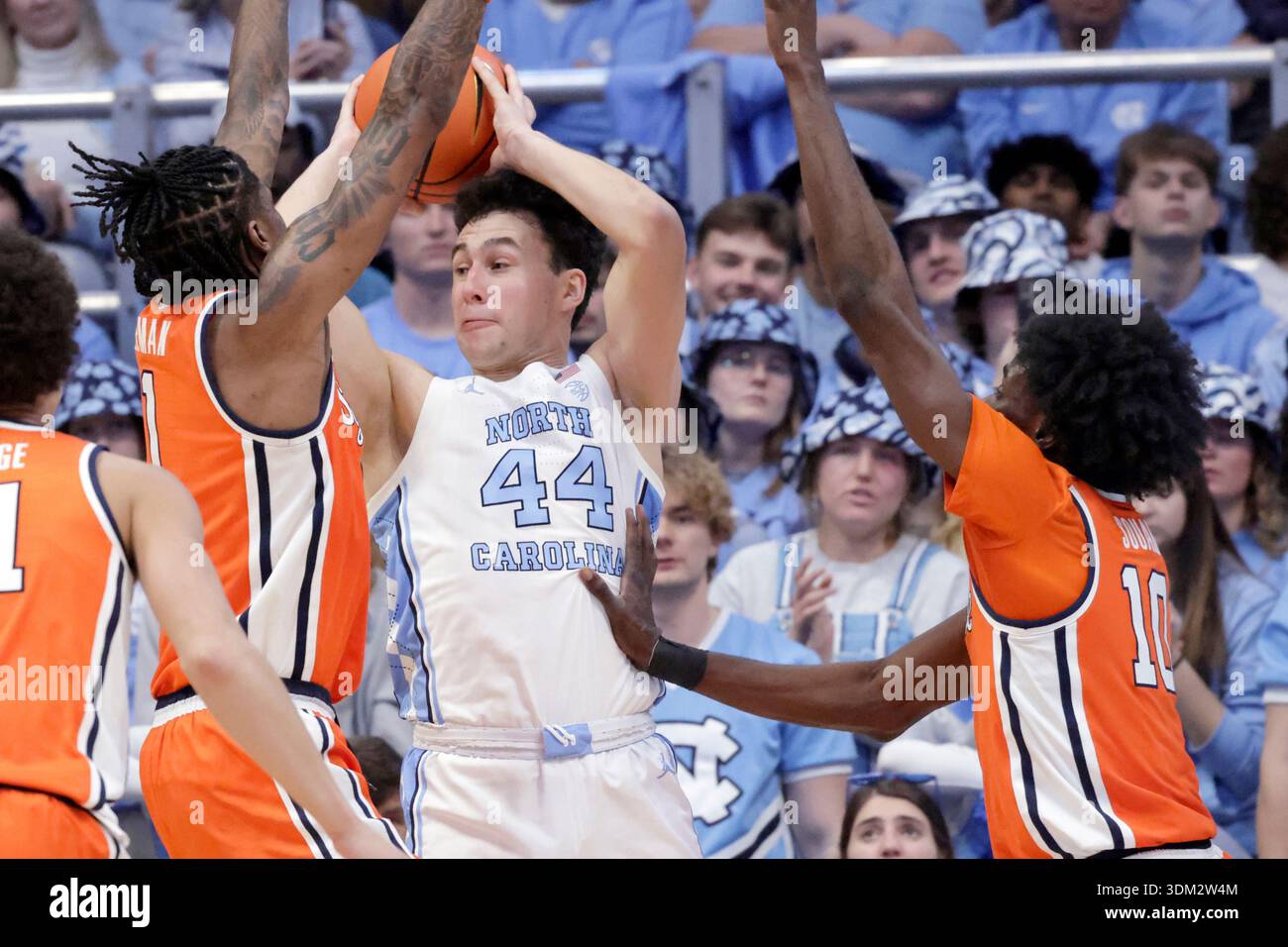 North Carolina guard Luka Bogavac (44) is defended by Syracuse forward ...