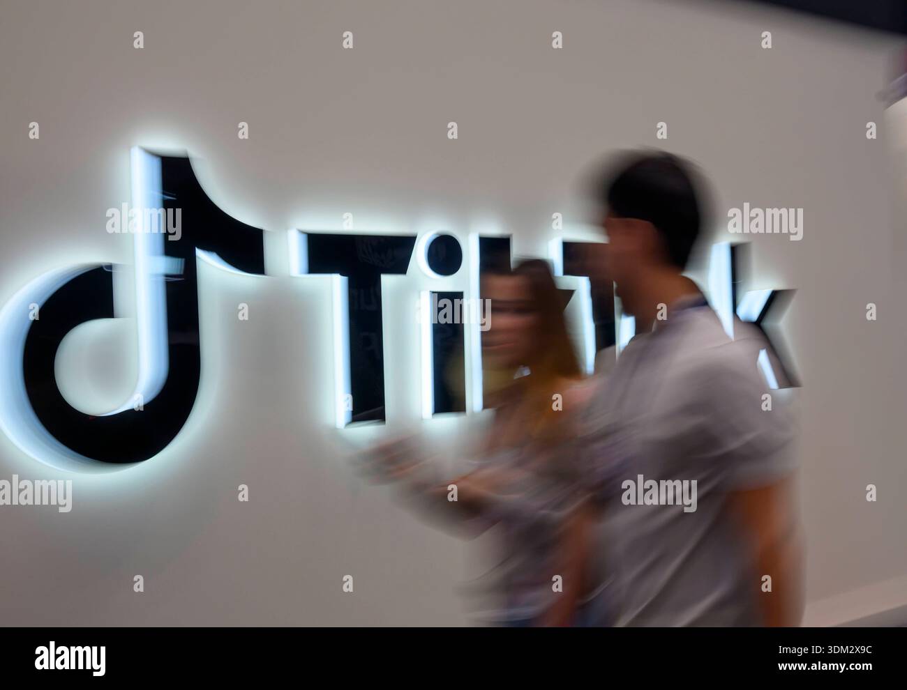 WEB SUMMIT QATAR 2026 DAT THREE Web Summit attendees walk past the ...
