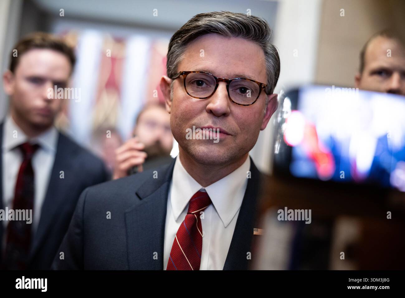 House Speaker Mike Johnson (R-La.) speaks with reporters as he departs ...