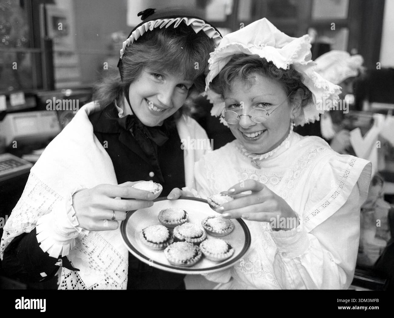 Girls in Victorian costume eating mince pies in York tea rooms 1986 ...