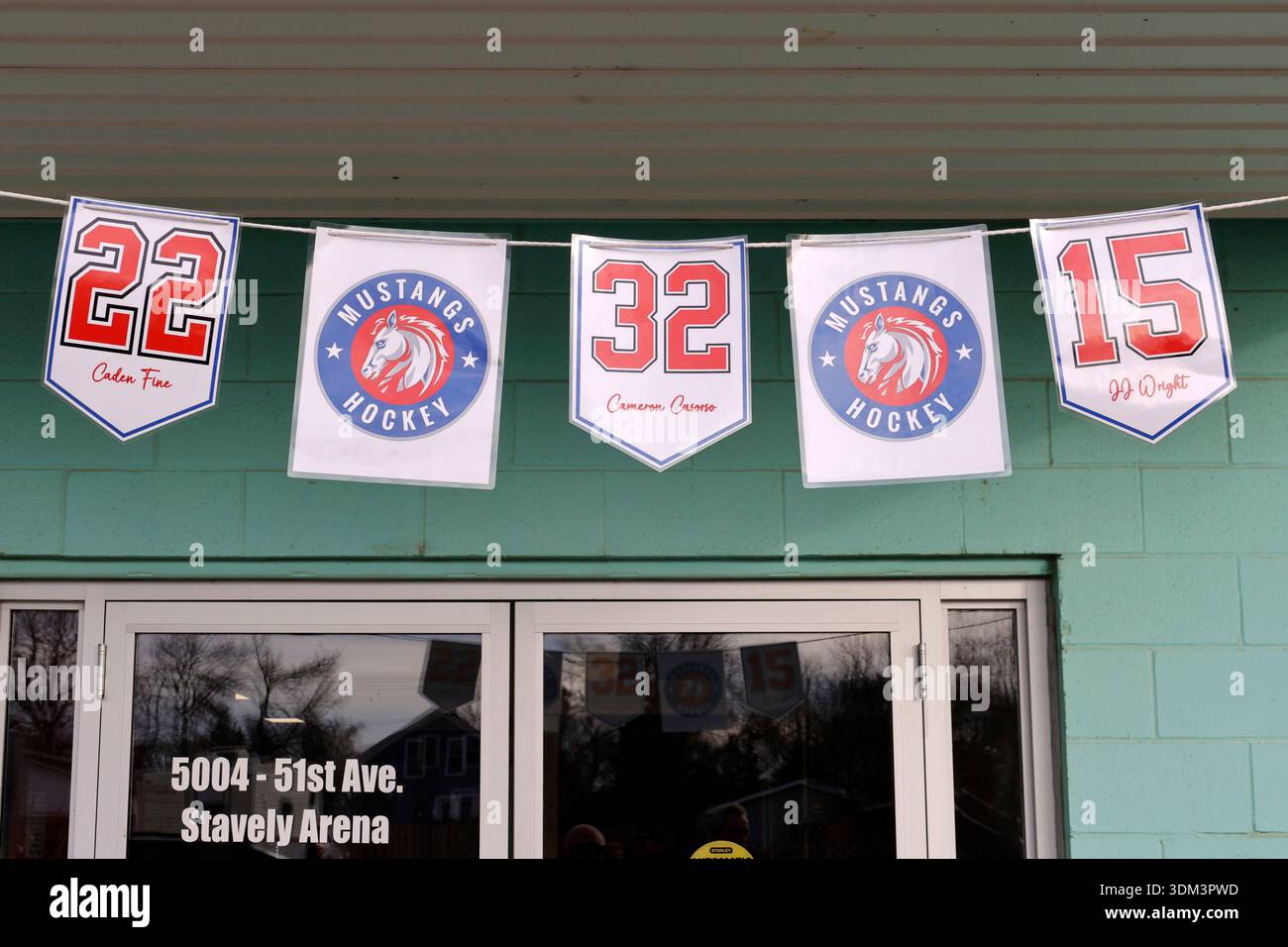 Outside Mustangs arena numbers hang for three junior hockey players ...