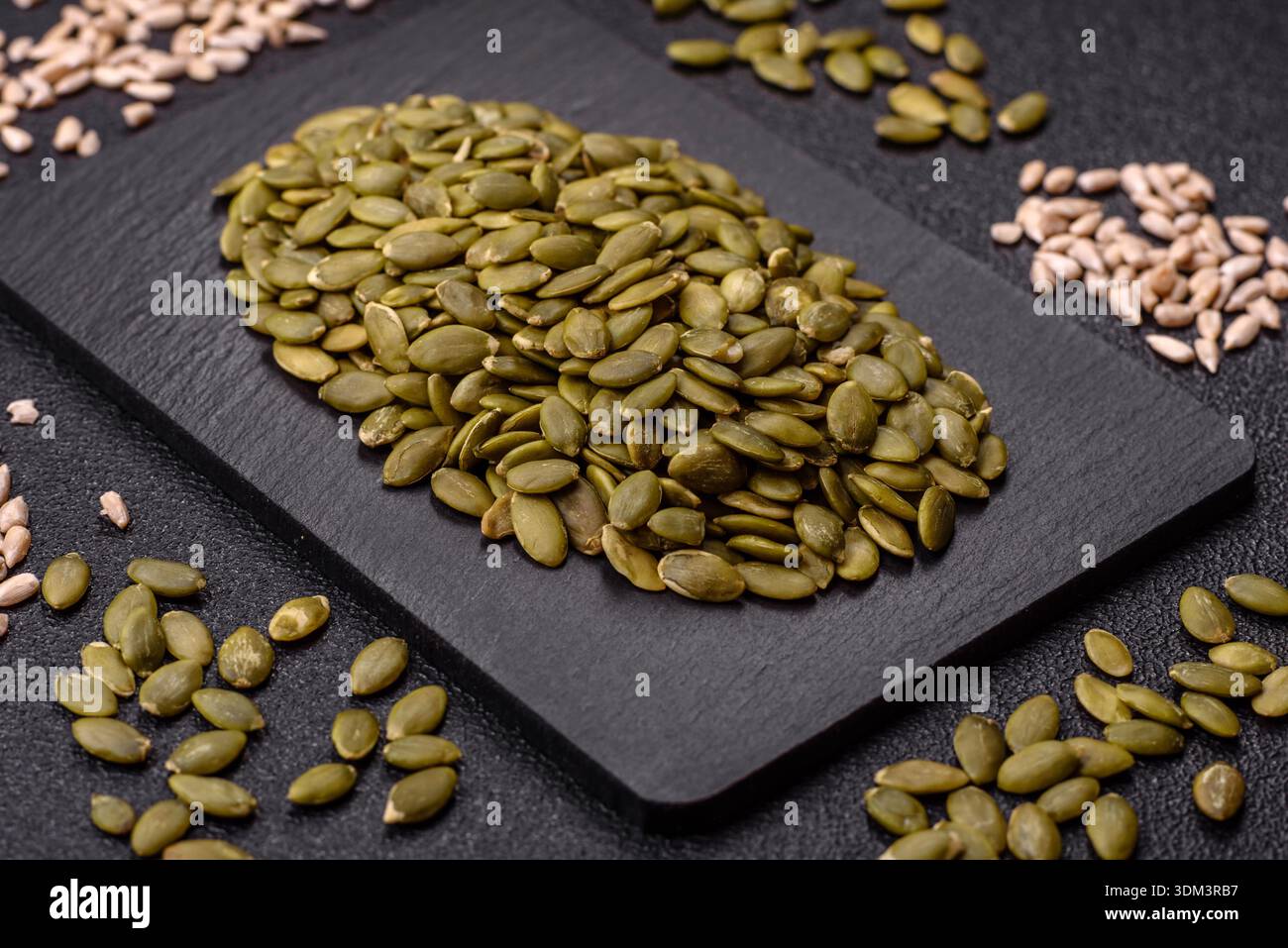 Shelled pumpkin seed kernels, salted, roasted, or raw, are a healthy ...