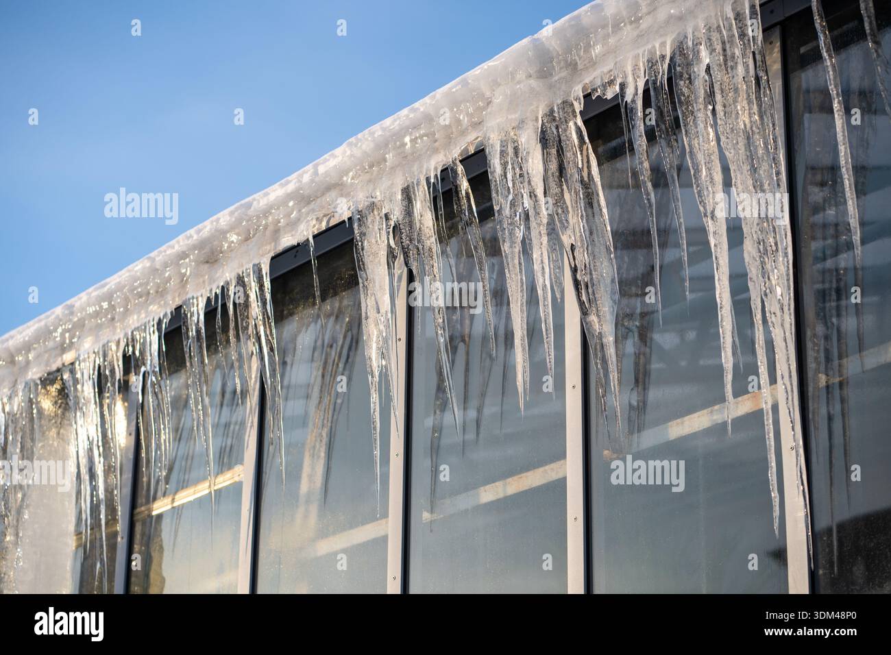 Icicles on outside industrial building hi-res stock photography and ...