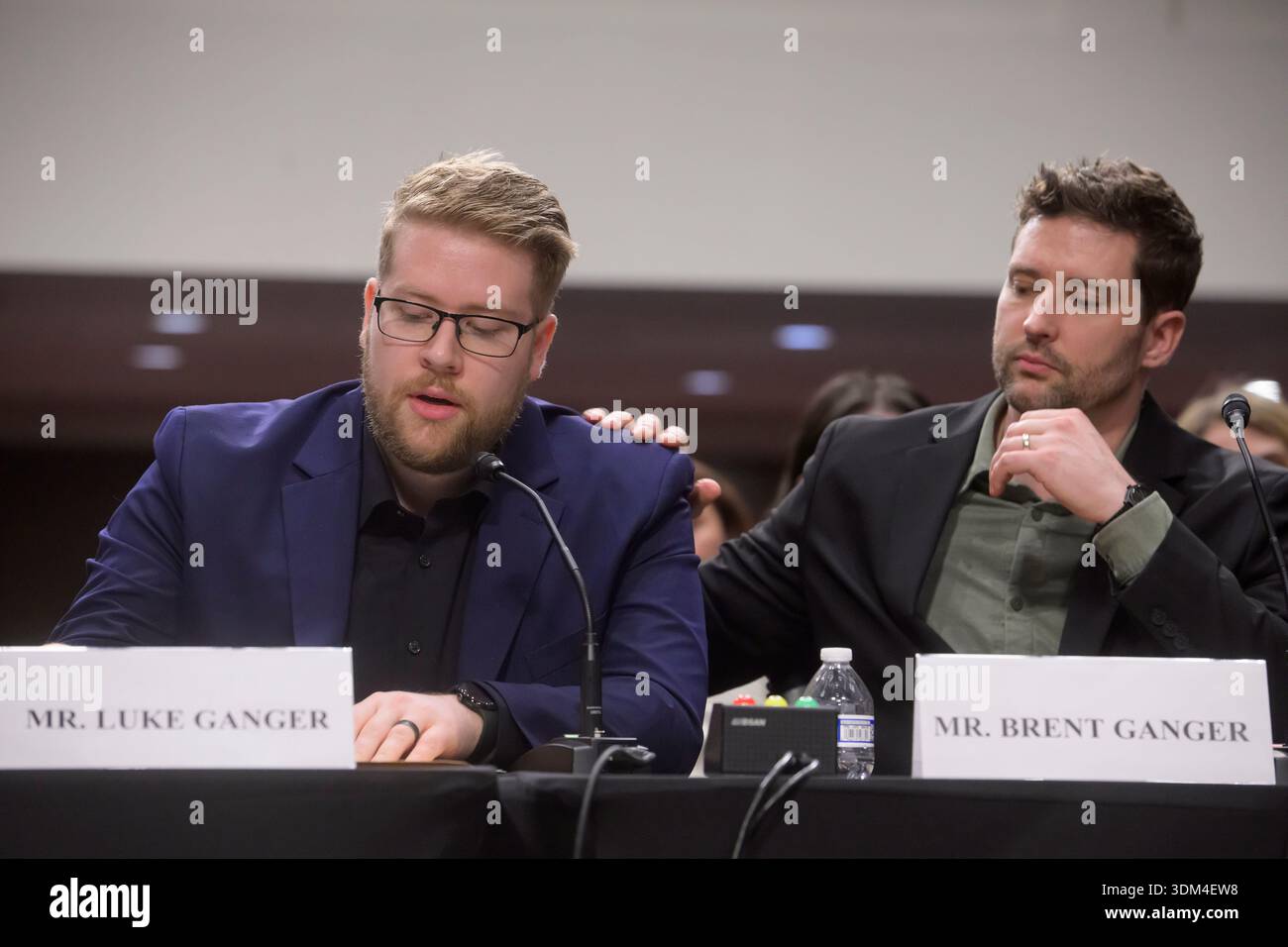 Luke Ganger, left, and Brent Ganger, right, brothers of Renee Good ...