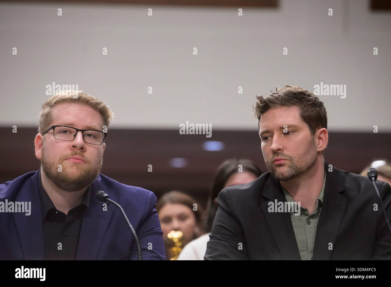 Luke Ganger, left, and Brent Ganger, right, brothers of Renee Good ...