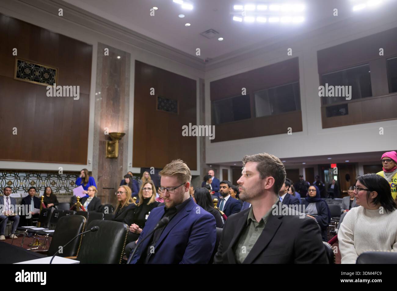 Luke Ganger, left, and Brent Ganger, right, brothers of Renee Good ...