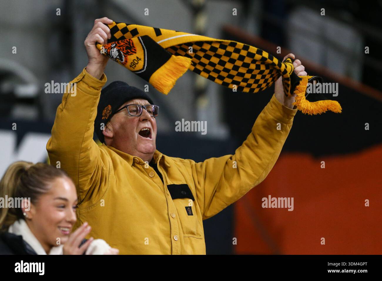 A Hull City fans holds a scarf during the Sky Bet Championship match ...