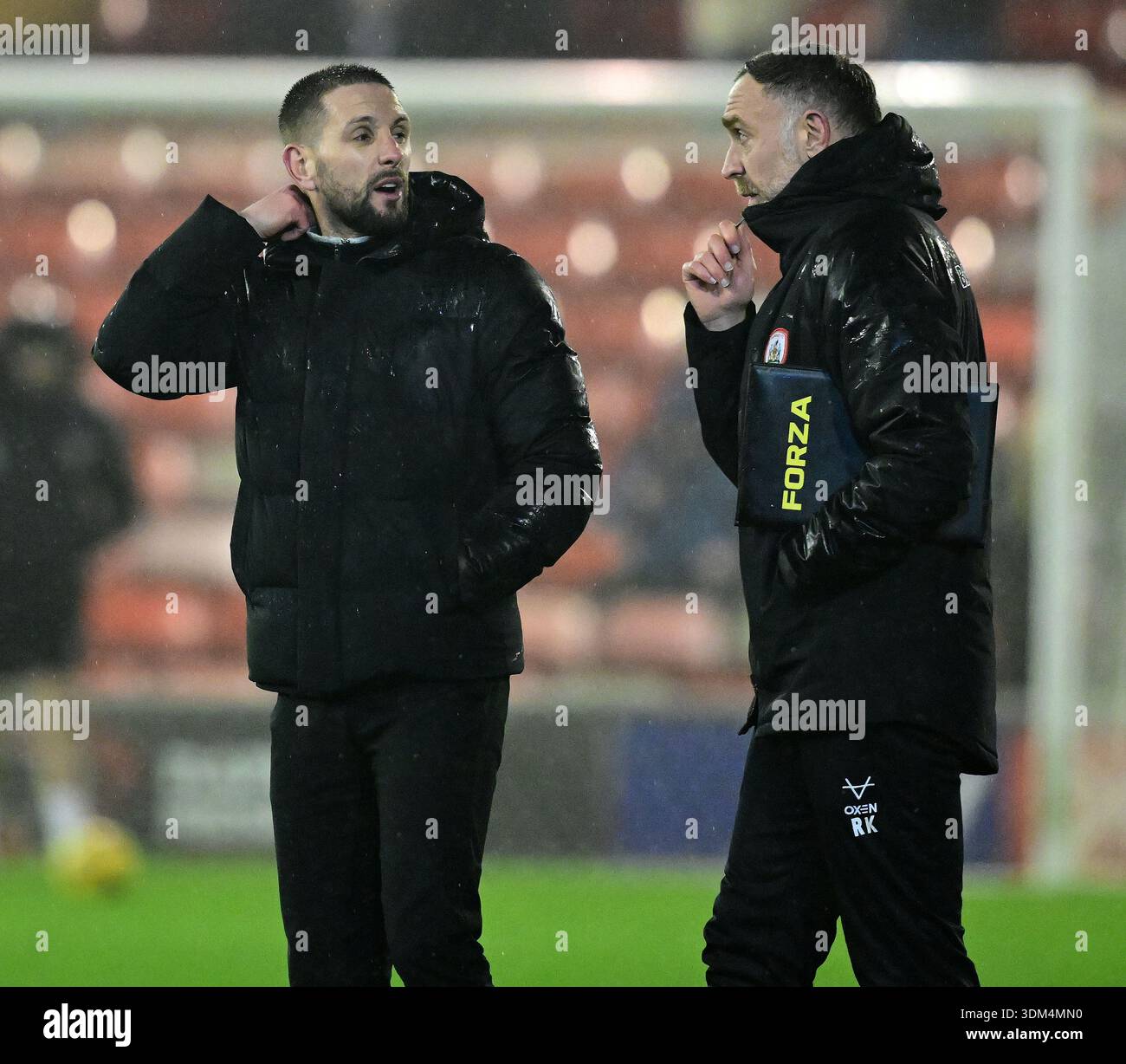 Barnsley's head coach Conor Hourihane and Barnsley's assistant head ...