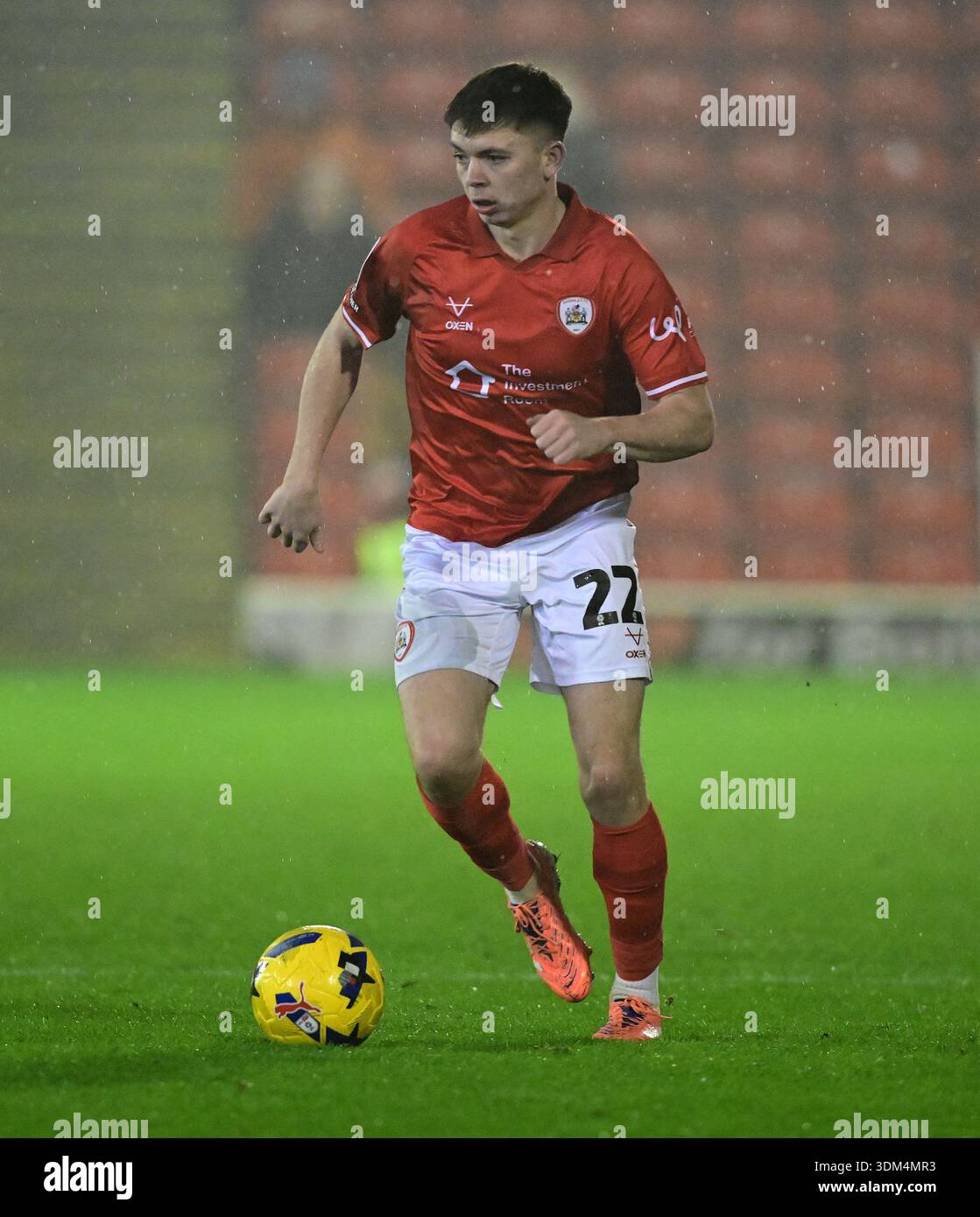 Barnsley's Patrick Kelly dribbles with the ball in the match between ...