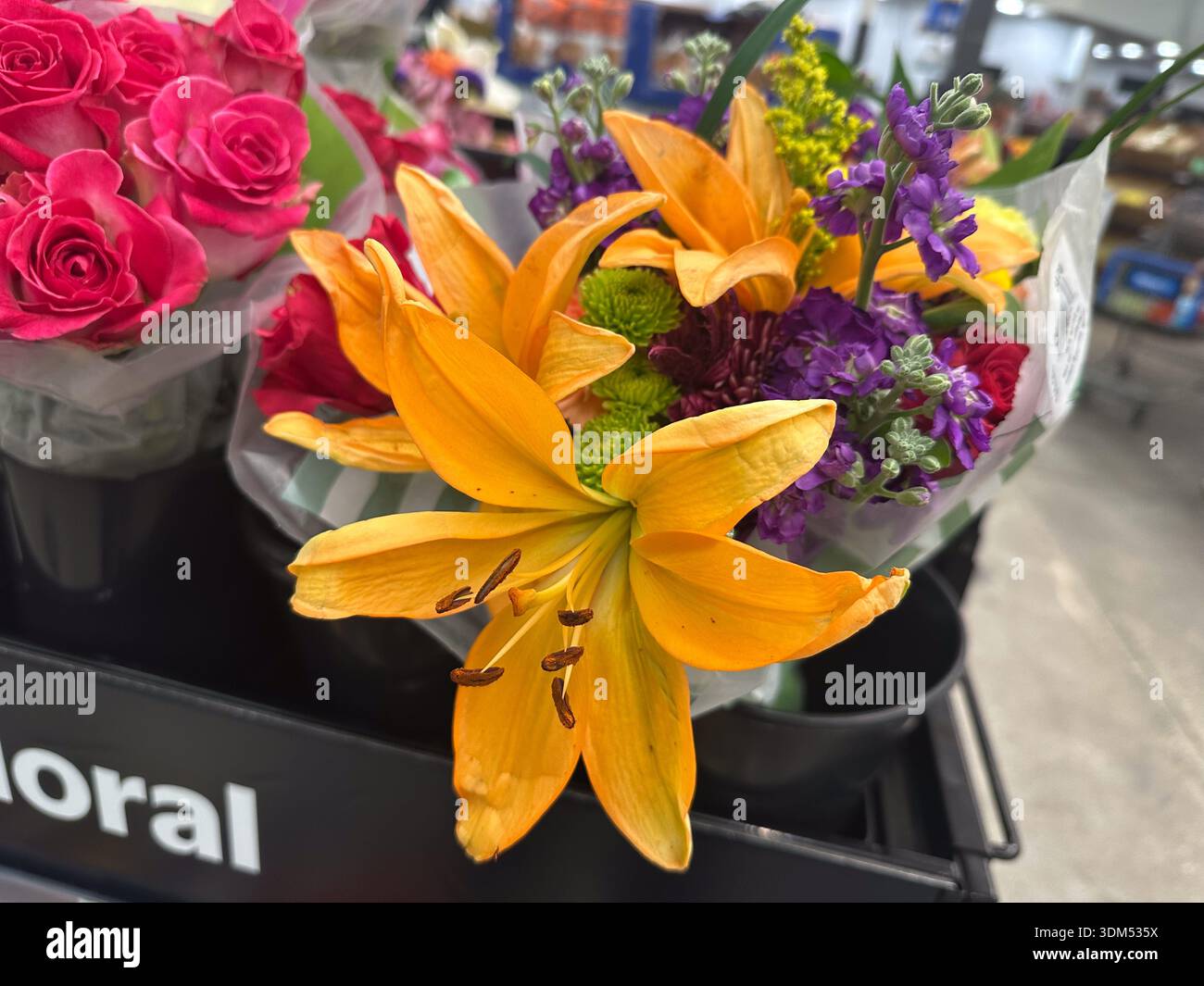 Fresh flower bouquets are displayed for sale at a Walmart store in ...