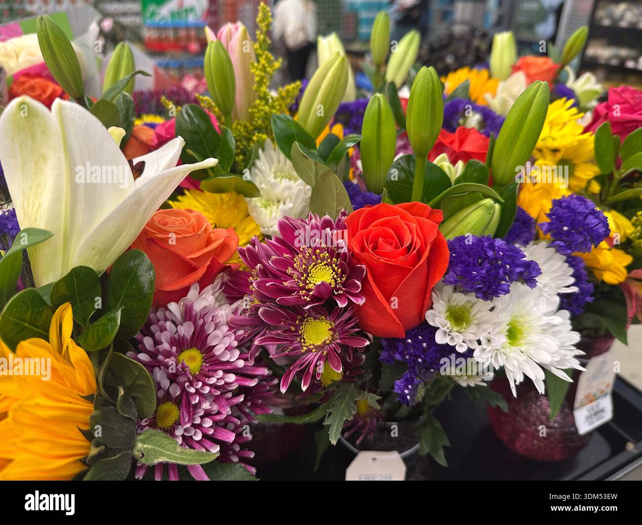 Fresh flower bouquets are displayed for sale at a Walmart store in ...