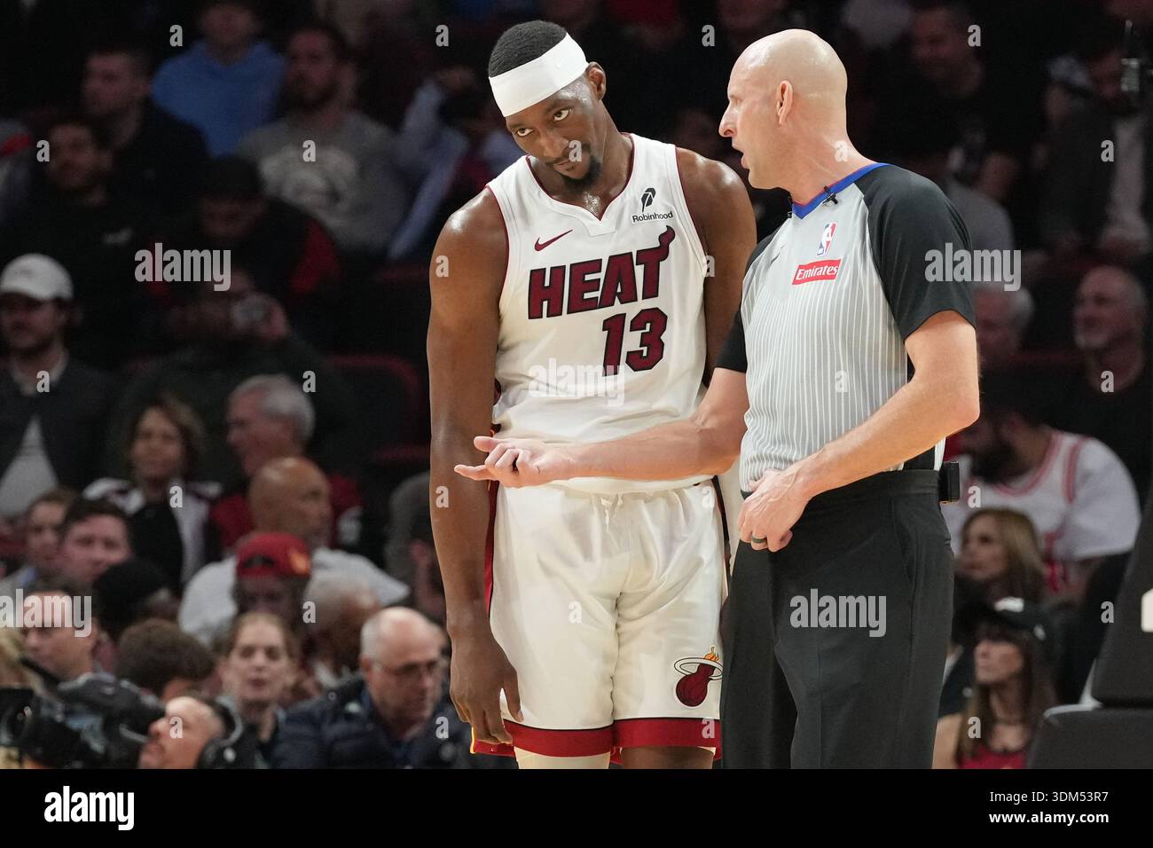 Miami Heat center Bam Adebayo (13) reacts to a call by referee Eric ...