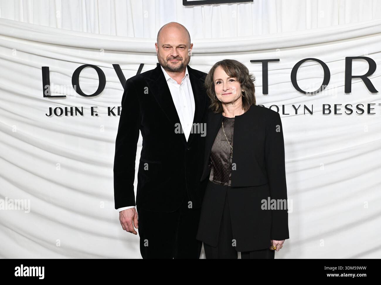 Brad Simpson, left, and Nina Jacobson attend the premiere of FX's "Love ...