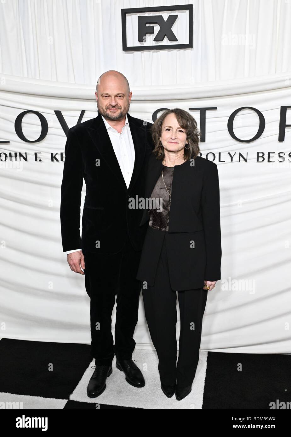 Brad Simpson, left, and Nina Jacobson attend the premiere of FX's "Love ...