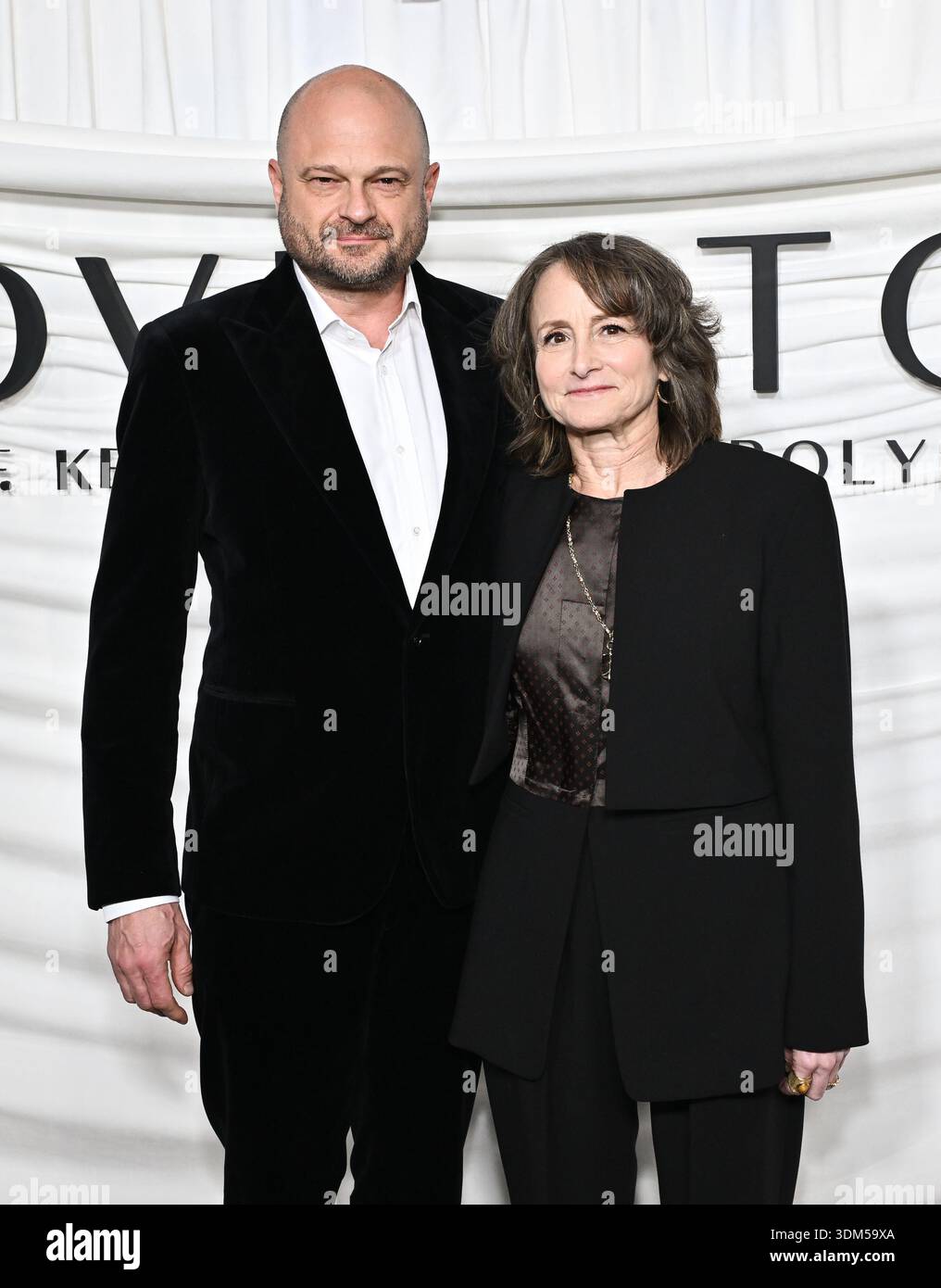 Brad Simpson, left, and Nina Jacobson attend the premiere of FX's "Love ...