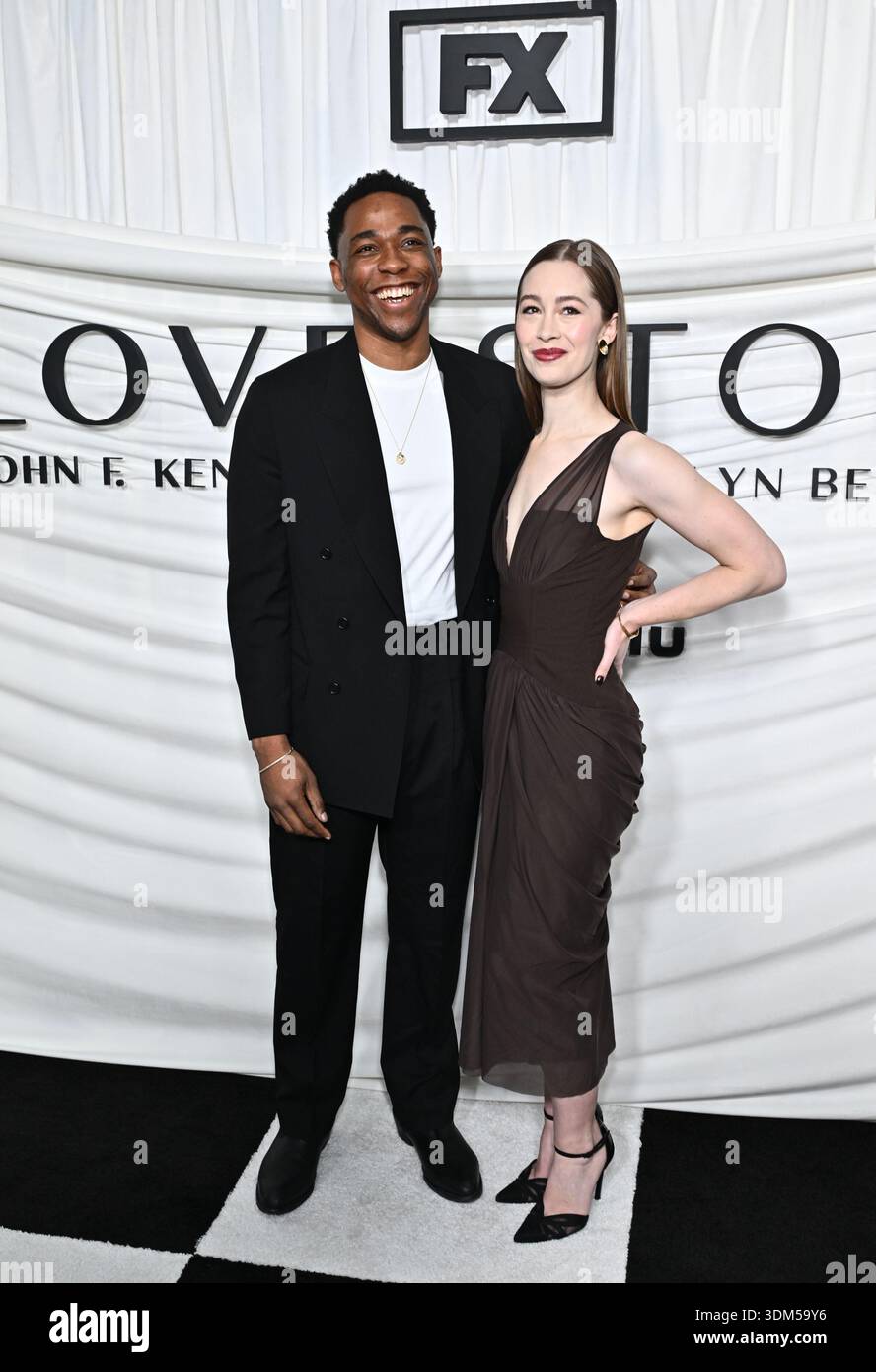 Omari K. Chancellor, left, and guest attend the premiere of FX's "Love ...