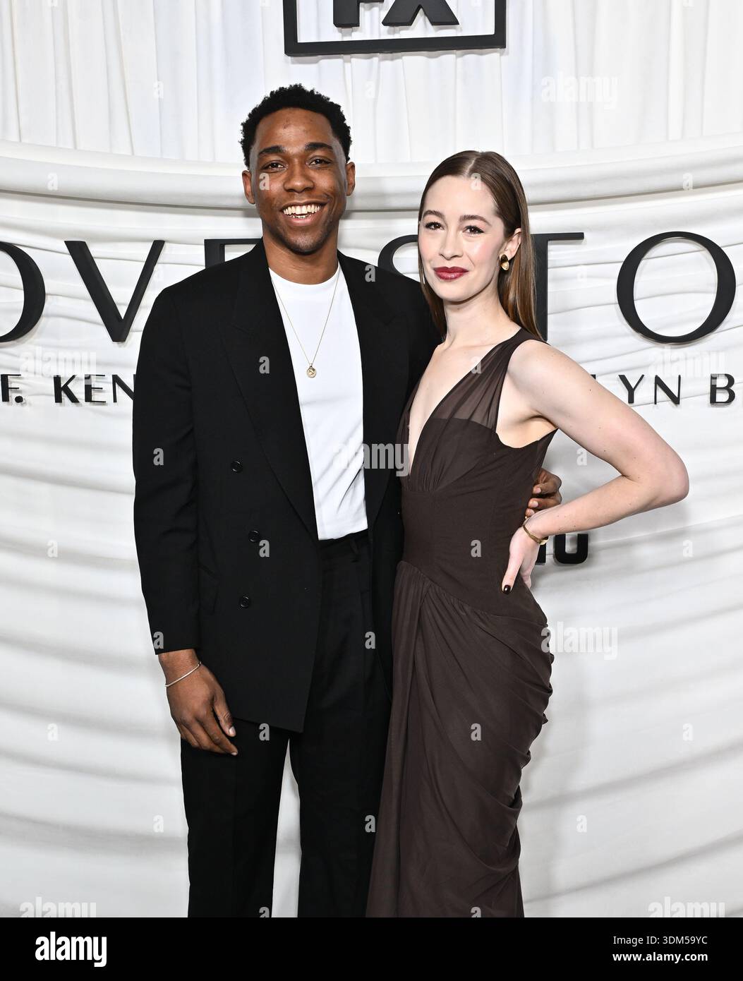 Omari K. Chancellor, left, and guest attend the premiere of FX's "Love ...