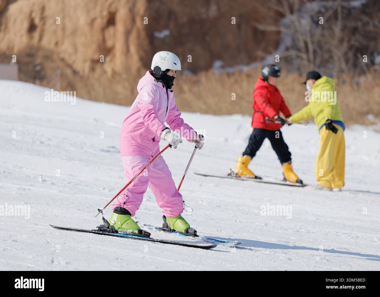 Skiing enthusiasts enjoy winter sports at Gufeng Mountain Ski Resort in ...