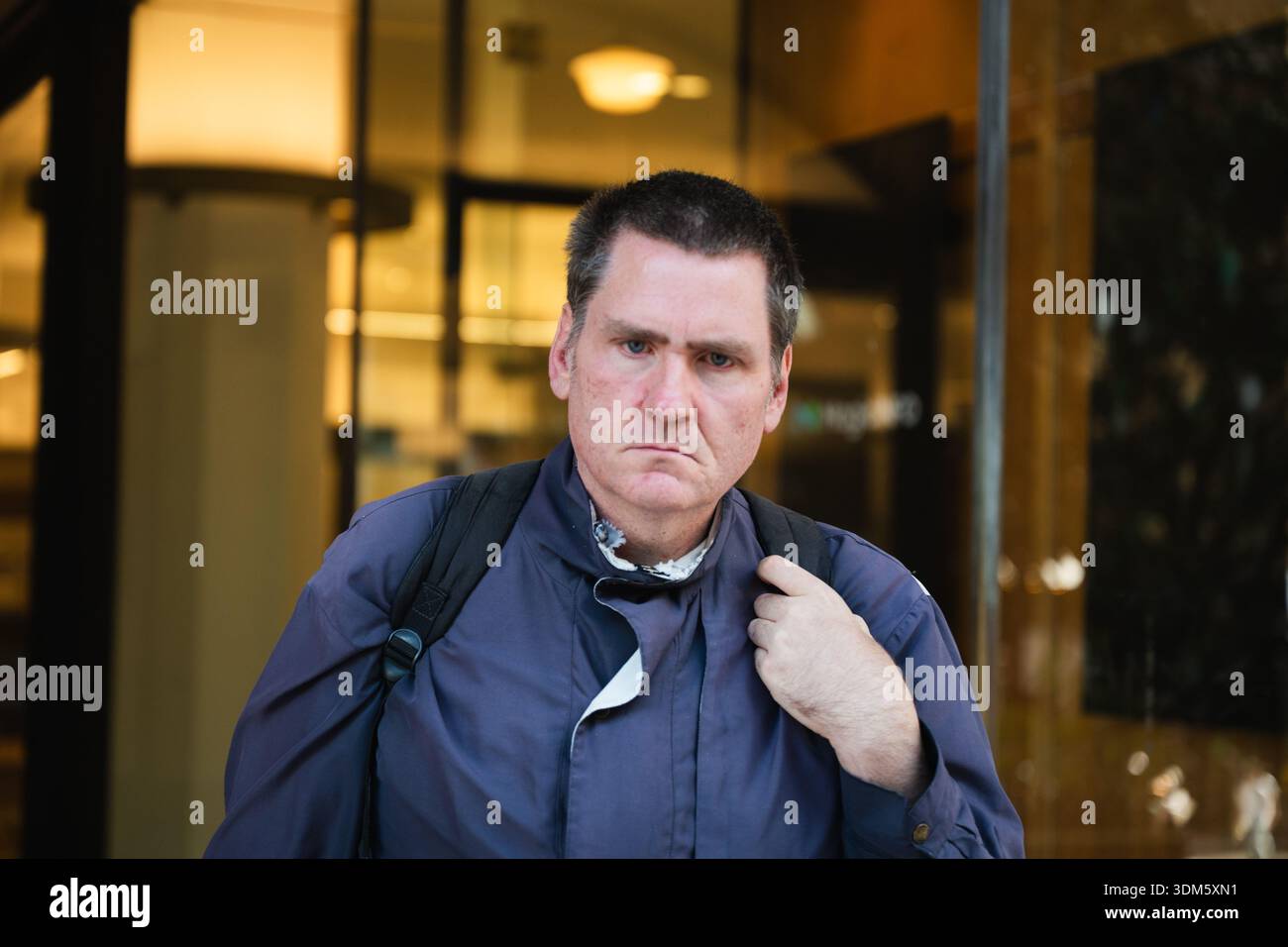 Craig Mitchell leaves the Downing Centre Court, Sydney, Wednesday ...