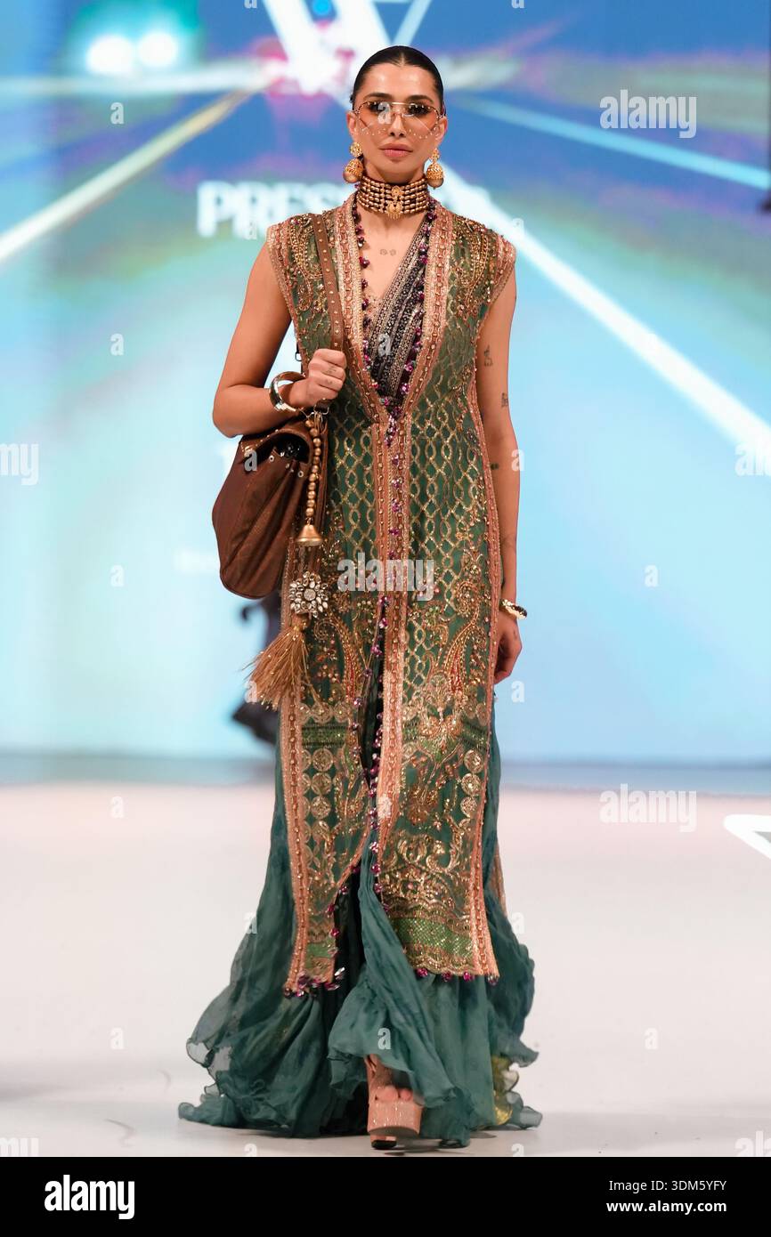 Lahore, Pakistan. 04th Feb, 2026. A model presents a creation by ...