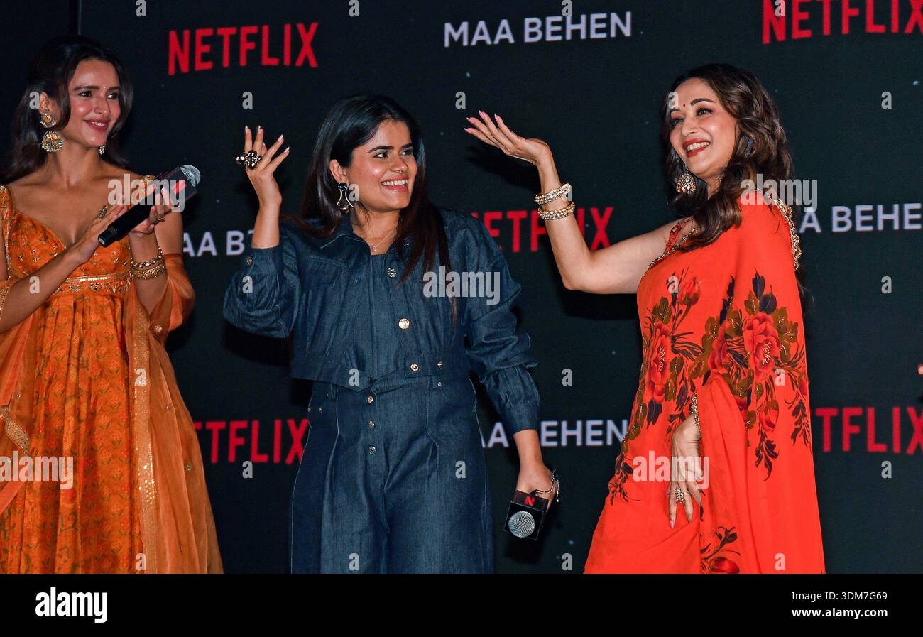 Bollywood actress Madhuri Dixit (R) dance as digital creator Dharna ...