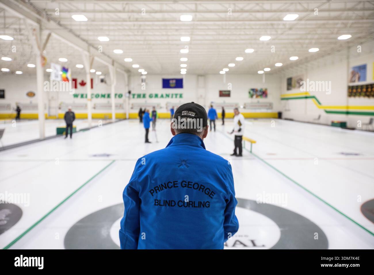 A team member of Prince George prepares to throw a rock during the ...