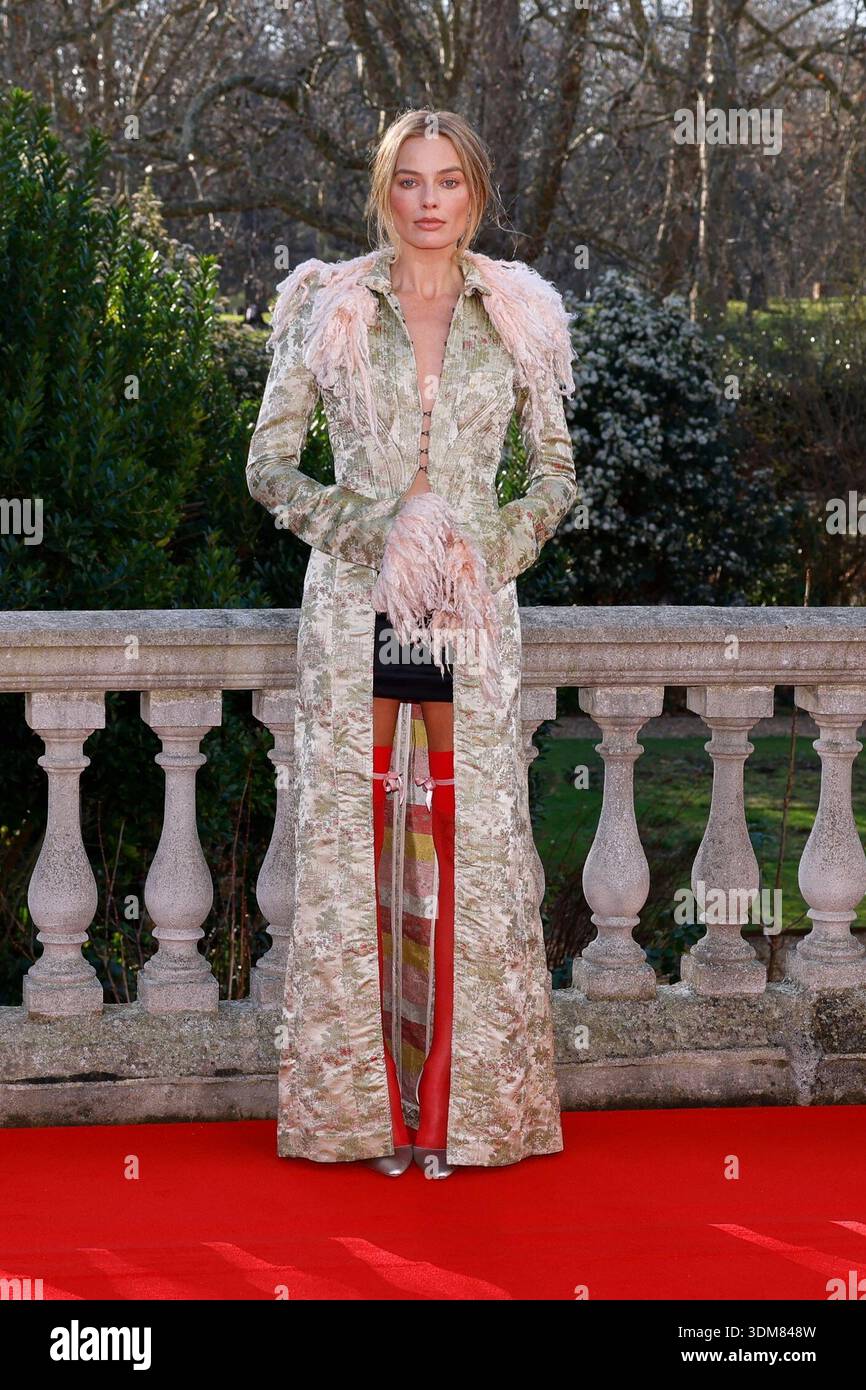 Margot Robbie poses for photographers at the photo call for the film ...