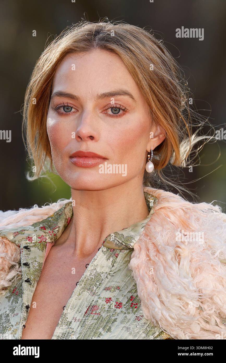 Margot Robbie poses for photographers at the photo call for the film ...