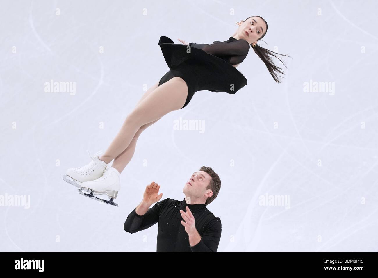 Lia Pereira and Trent Michaud, of Canada, perform during a figure ...